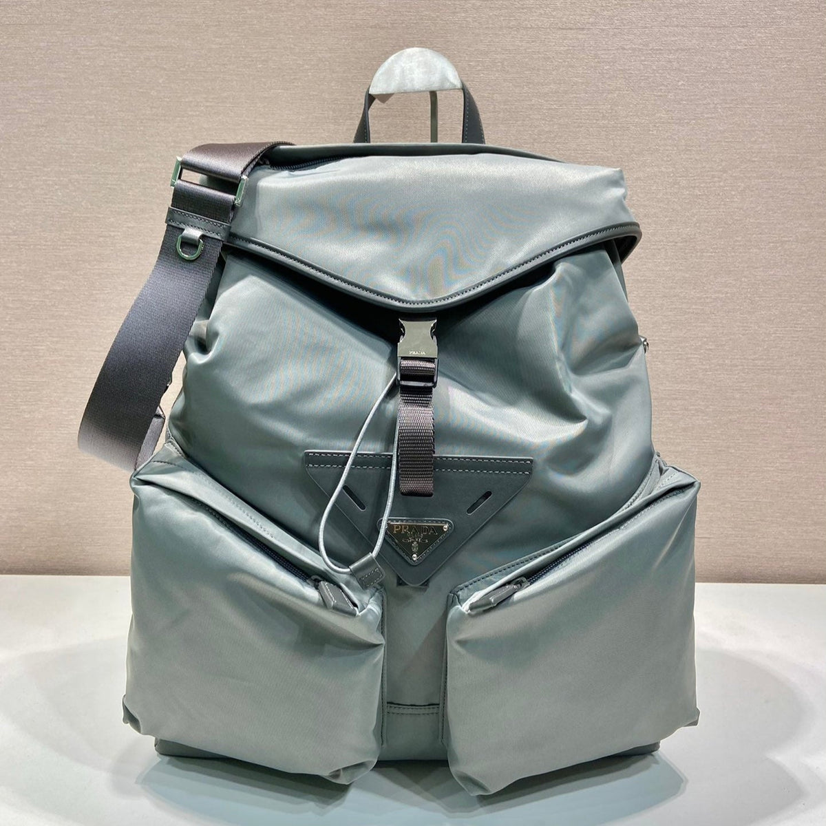 TRIANGLE LOGO BACKPACK 45 IN ASH GRAY RE-NYLON – Amejews